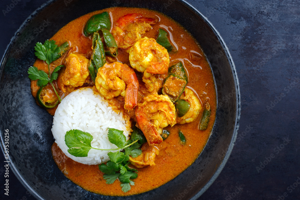 Traditional Thai kaeng phet red curry with chili and basmati rice ...