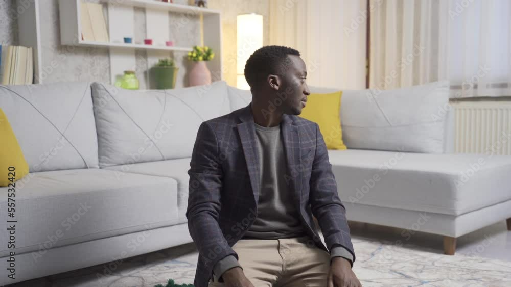 African Muslim young man praying at home, worshiping Allah. Muslim ...