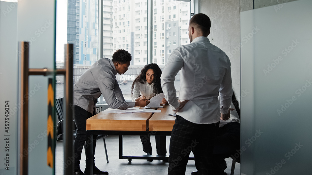 Back view businessman opening door to office walk into boardroom to ...
