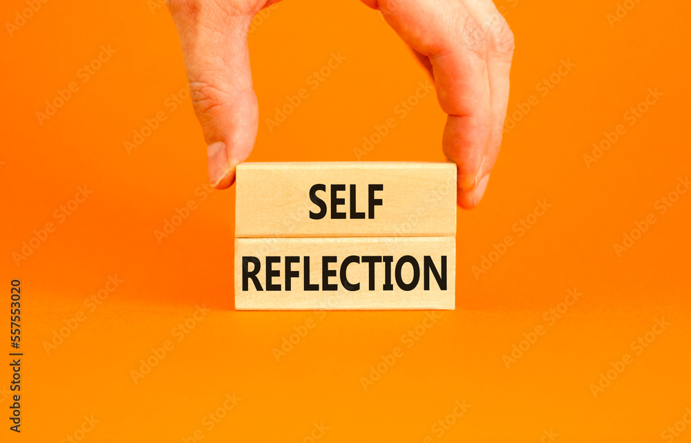 Self reflection symbol. Concept word Self reflection typed on wooden ...