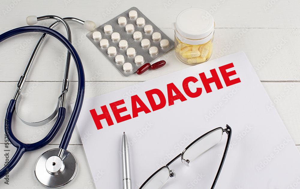 HEADACHE text on keyboard with stethoscope , medical concept Stock ...
