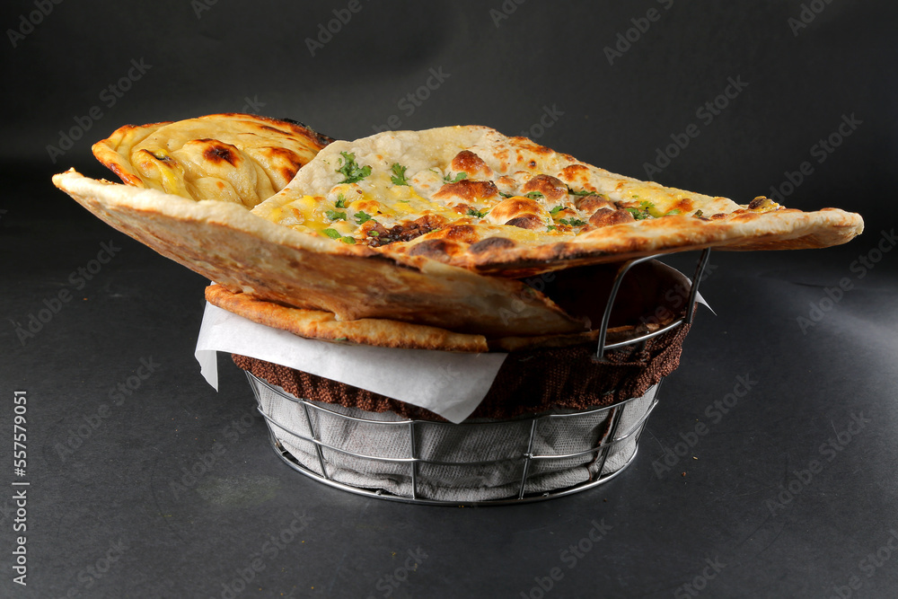 Healthy pastry Arabid Indian Pakistani Naan Roti paratha butter sliced ...