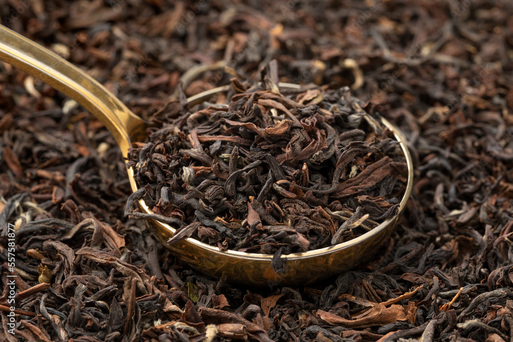 Indian Tukvar darjeeling dried tea leaves close up full frame as ...