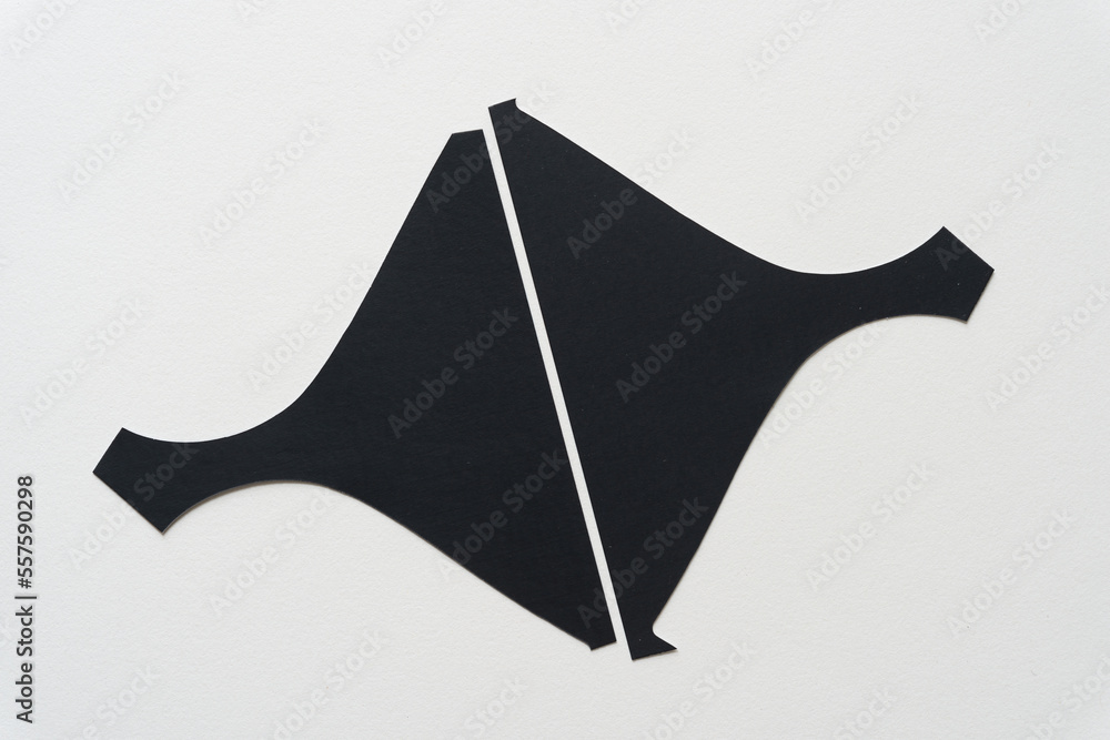 Poster two abstract funnel shapes joined together on their straight ...