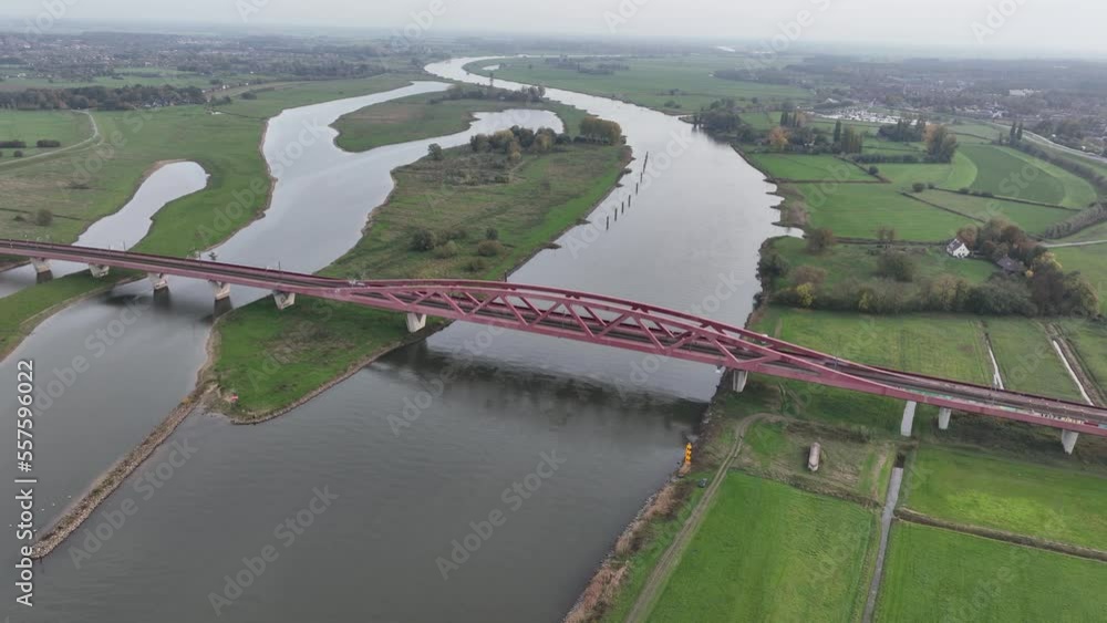 The Hanzeboog railway bridge near Zwolle over the river IJssel part of ...