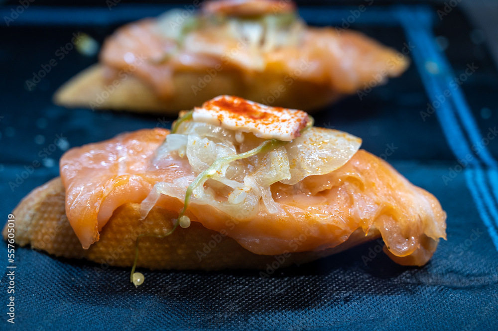 Typical snack of Basque Country, pinchos or pinxtos, small piece of ...