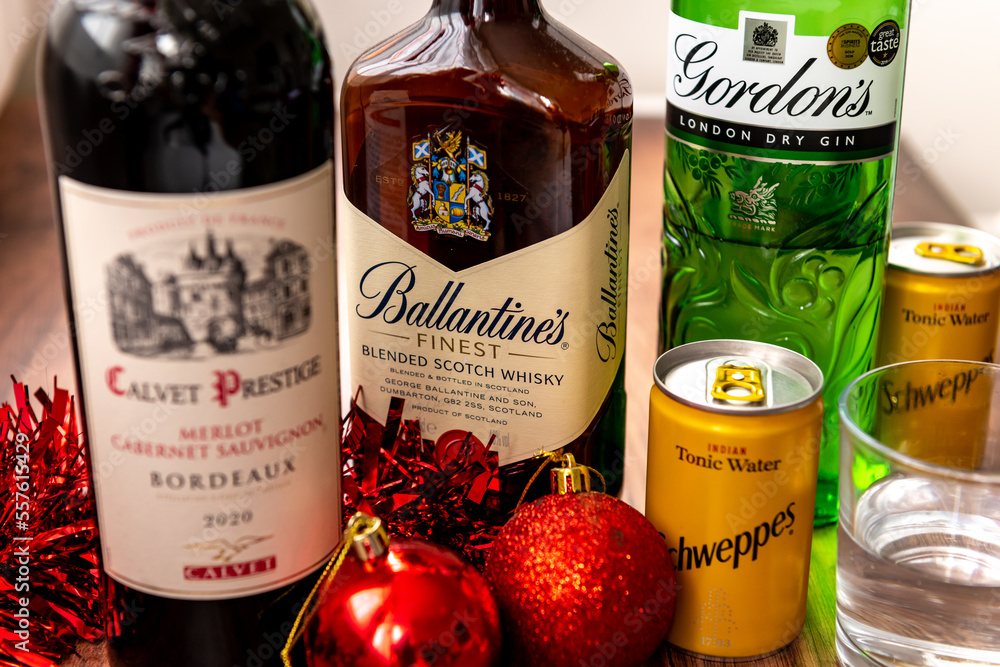 London. UK- 12.31.2022. Bordeaux red wine, Ballantine's Scotch whisky ...