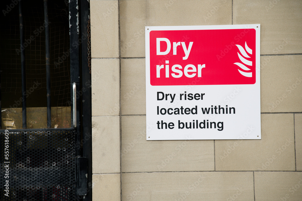 Dry riser located within the building sign Stock Photo | Adobe Stock