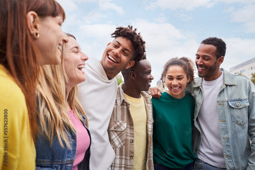 Young people walking laughing Happy friendship group of mixed race ...