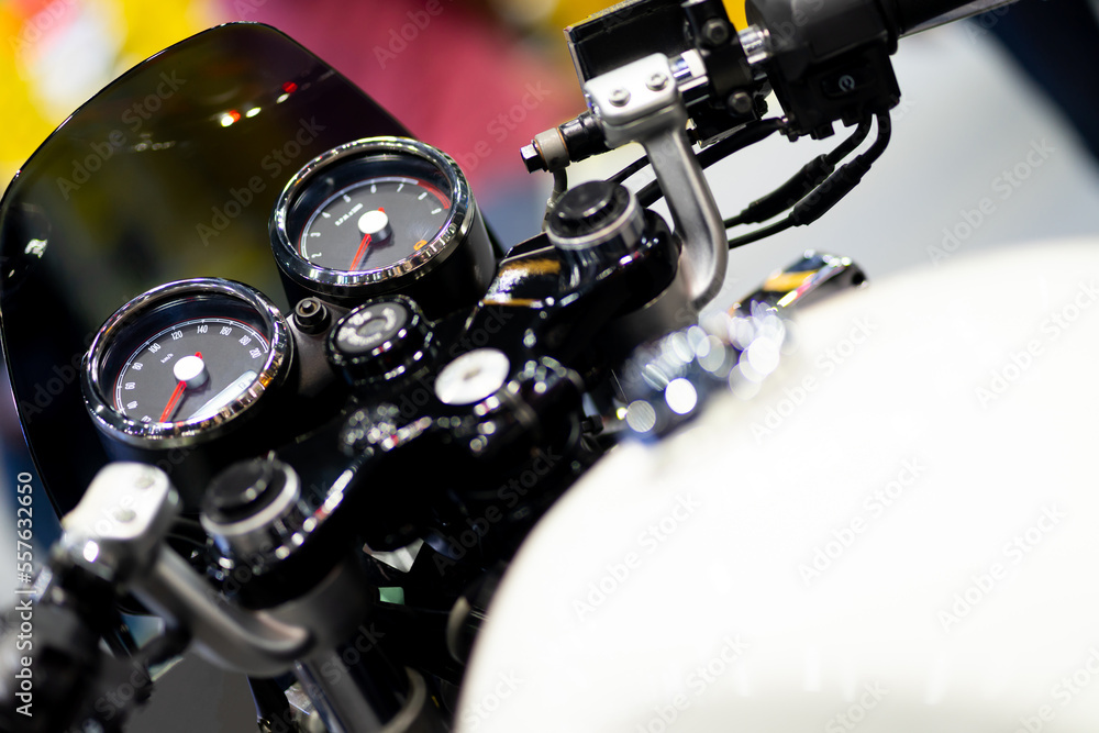 Horizontal close-up of the speedometer and tachometer of a vintage ...