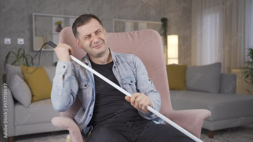 Vídeo do Stock: Blind man crying at home. The blind man sitting on the ...