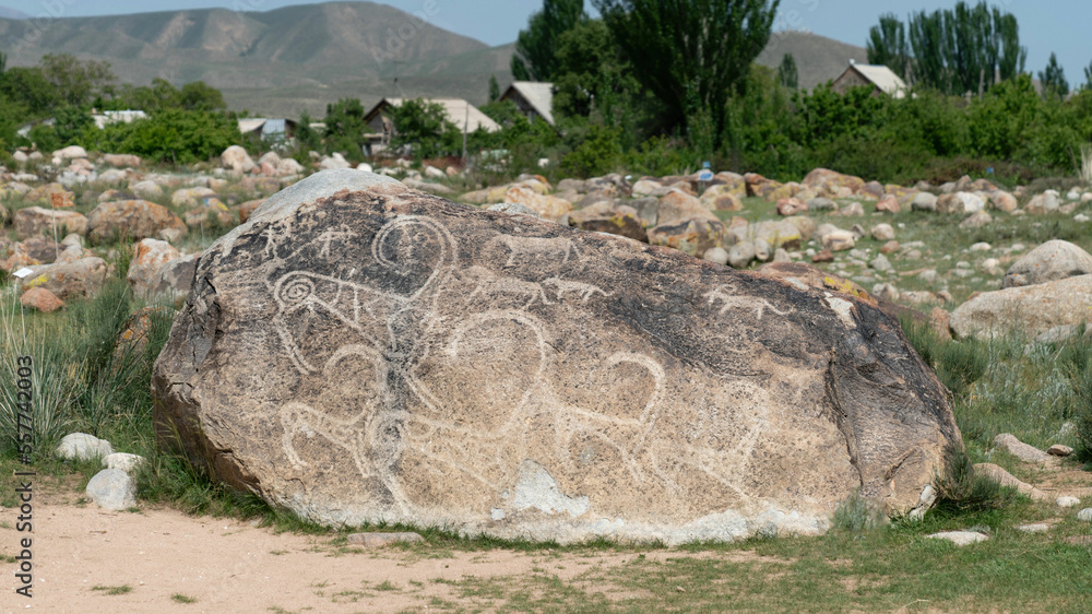 Petroglyph in Kyrgyzstan. An ancient rock carving and engraving known ...