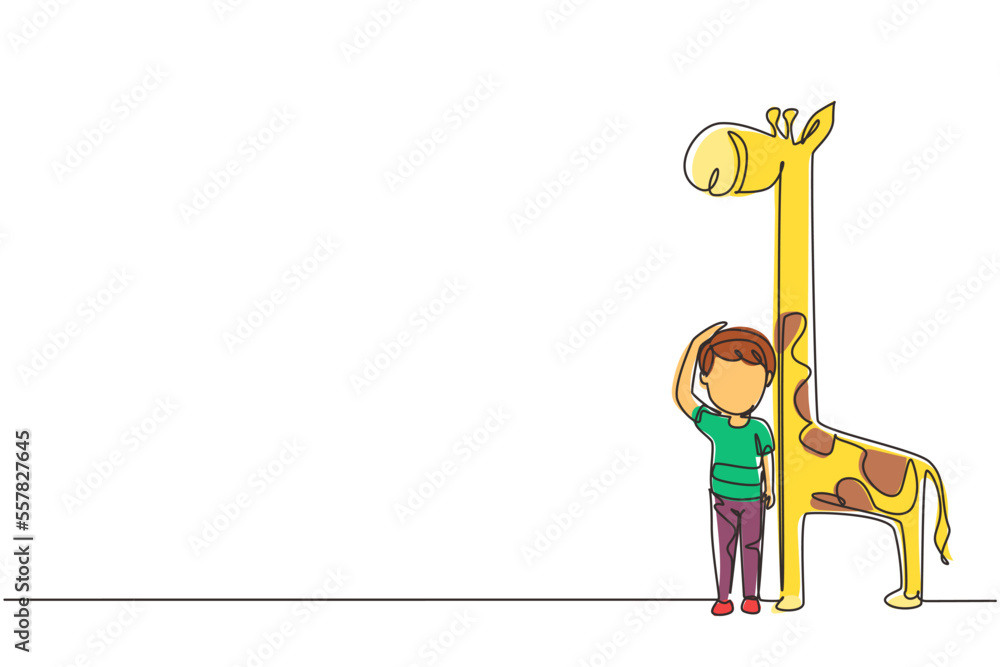 Single continuous line drawing little boy measuring his height with ...