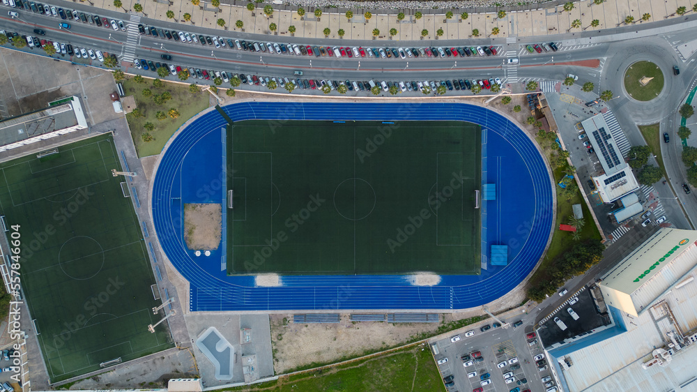 Aerial photography of a football stadium with an athletics track ...
