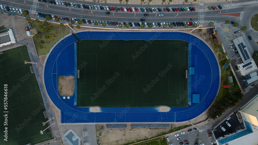 Aerial photography of a football stadium with an athletics track ...