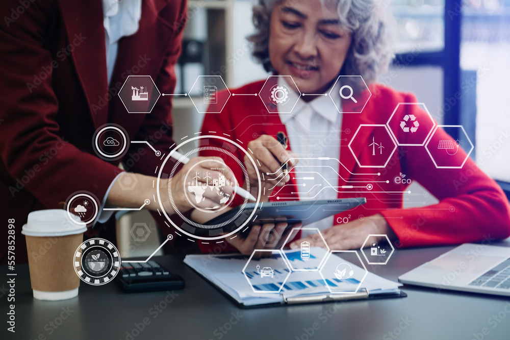 Business team working virtual modern smartphone to reduce CO2 emissions ...