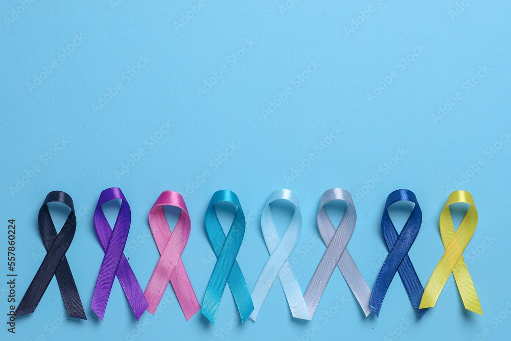 World cancer day arrange in line on blue background with copy space ...