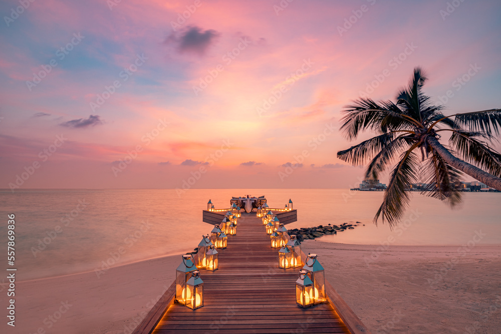 Seascape view under sunset light with dining table, wooden path and ...