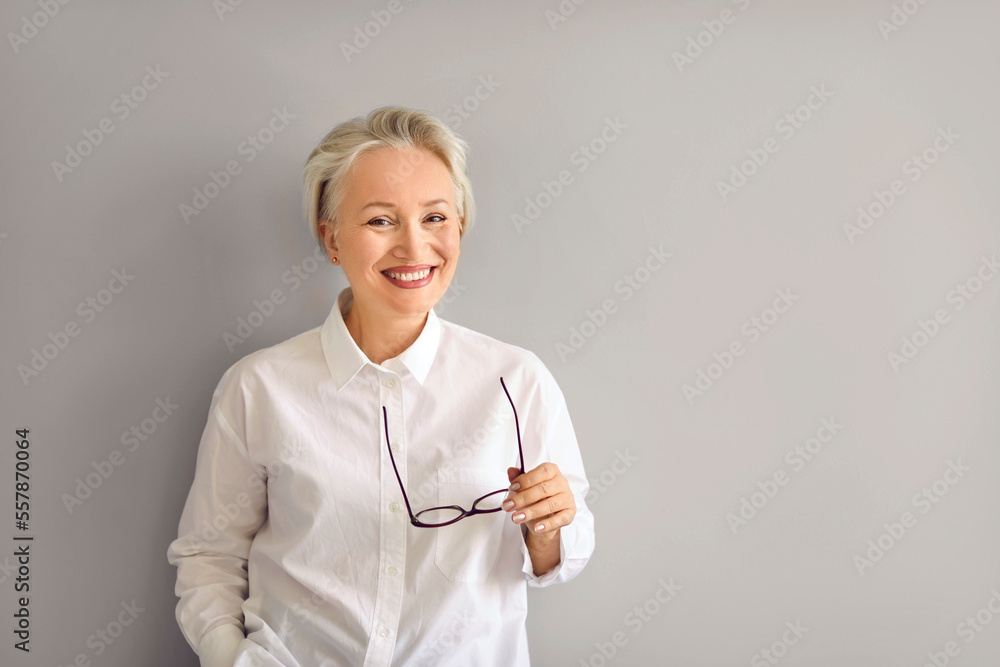 Portrait of happy stylish middle aged business woman. Beautiful mature ...