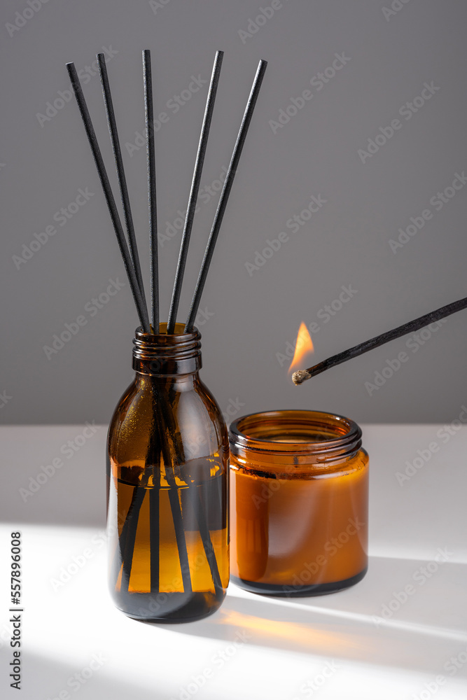 Aroma diffuser with natural essential oil in brown glass bottle, soy ...