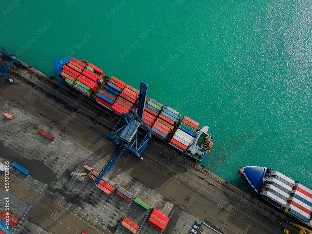 Container ship in industrial port in import, export trade logistic and ...