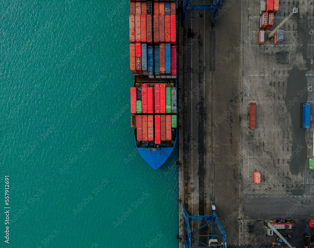 Container ship in industrial port in import, export trade logistic and ...