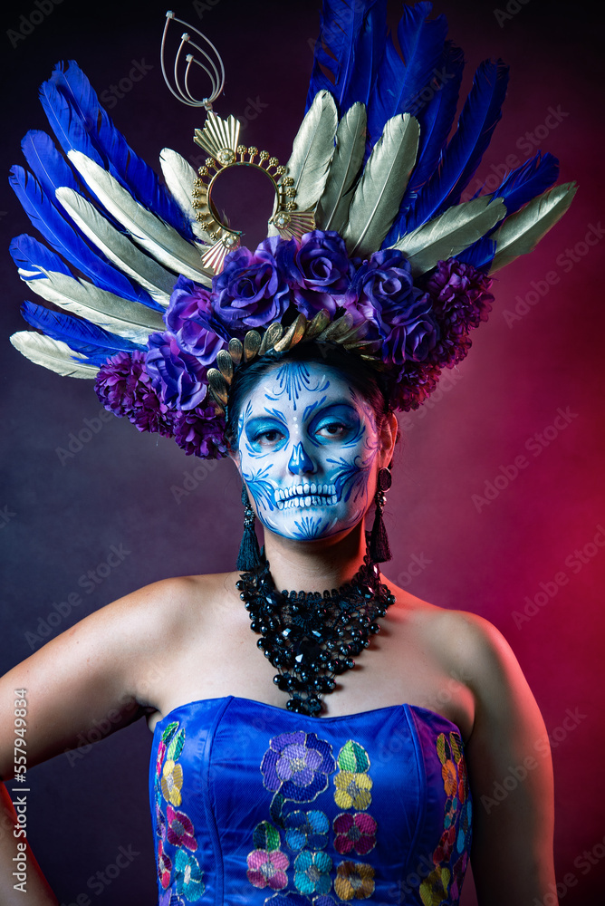 Mexican catrina woman dressed in talavera type costume in blue colors ...