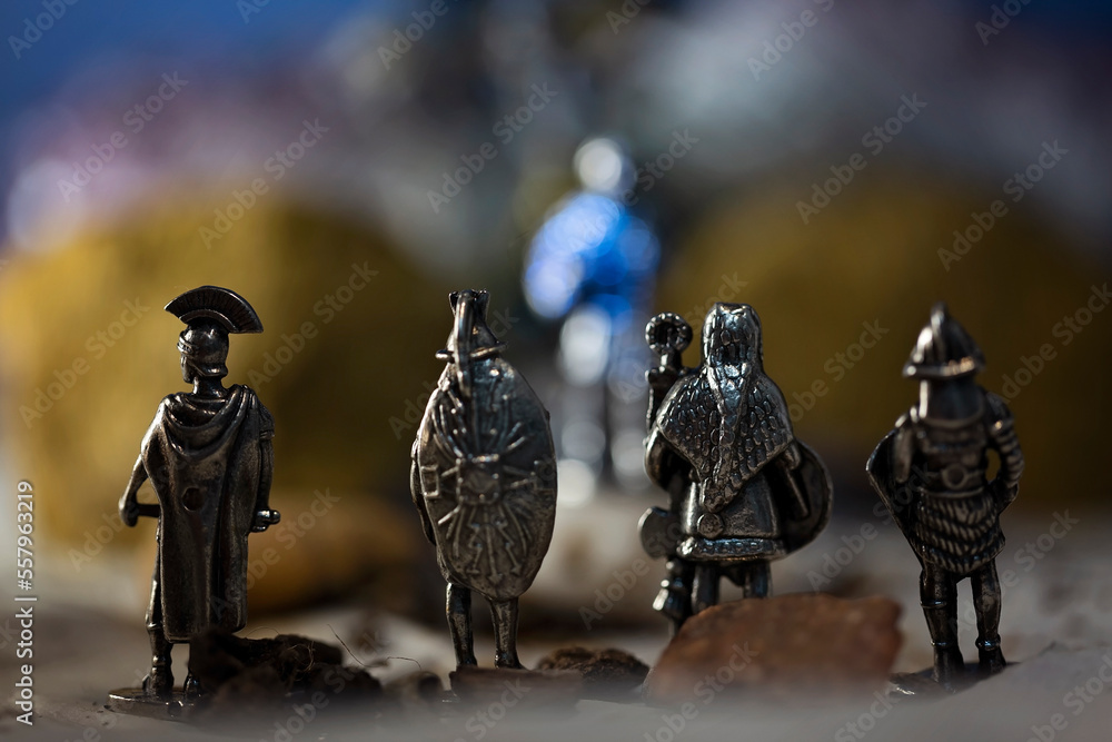 Roman soldier figurines.Small metal warrior figurines posed in small ...