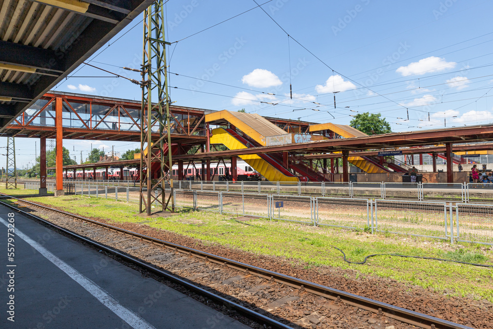 Old abandoned train station with pedestrian overpass, metal ancient ...