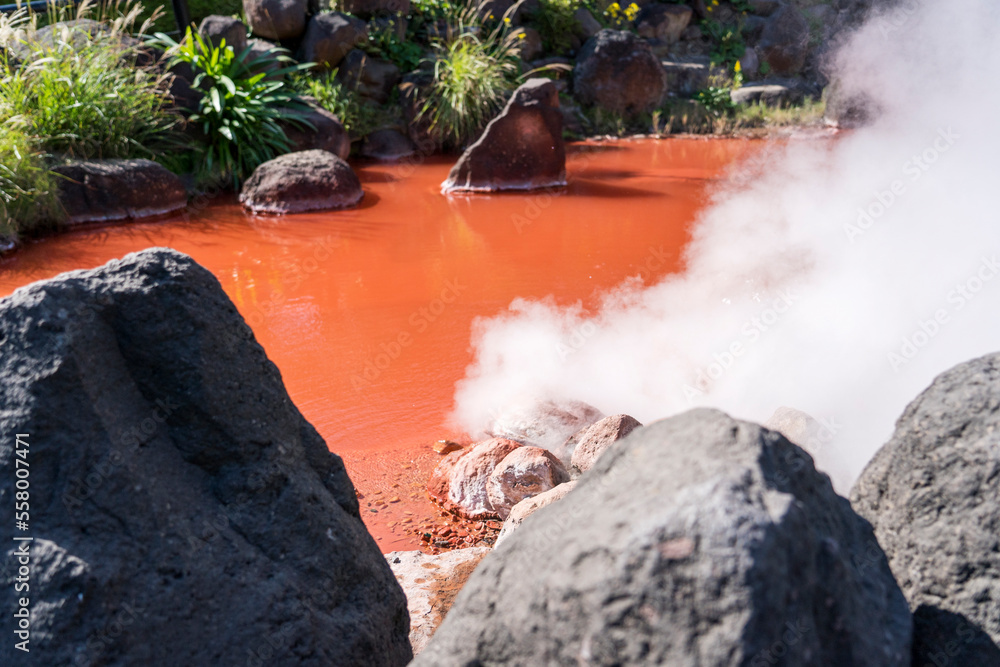 Red thermal pool Jigoku at Umijigoku in Beppu, Japan Stock Photo ...
