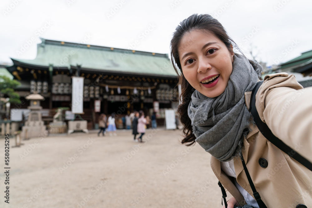 Foto de happy Asian Japanese girl tourist taking self portrait with the ...