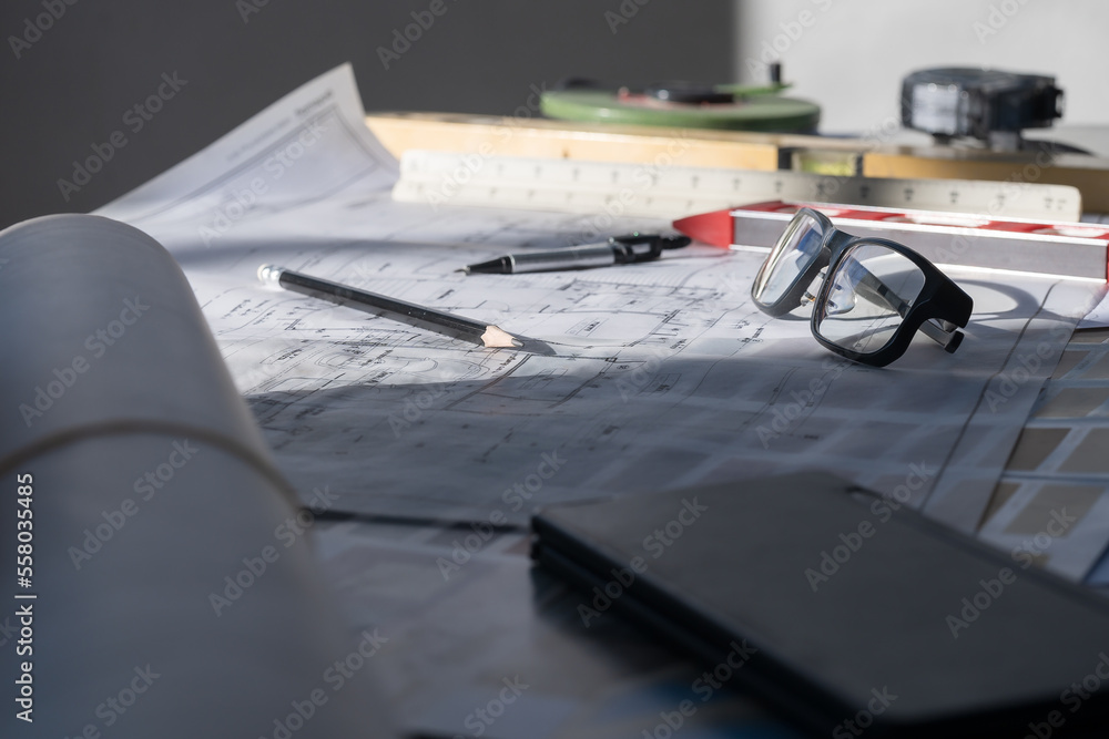 Architect concept, Architects working with blueprints in the office ...