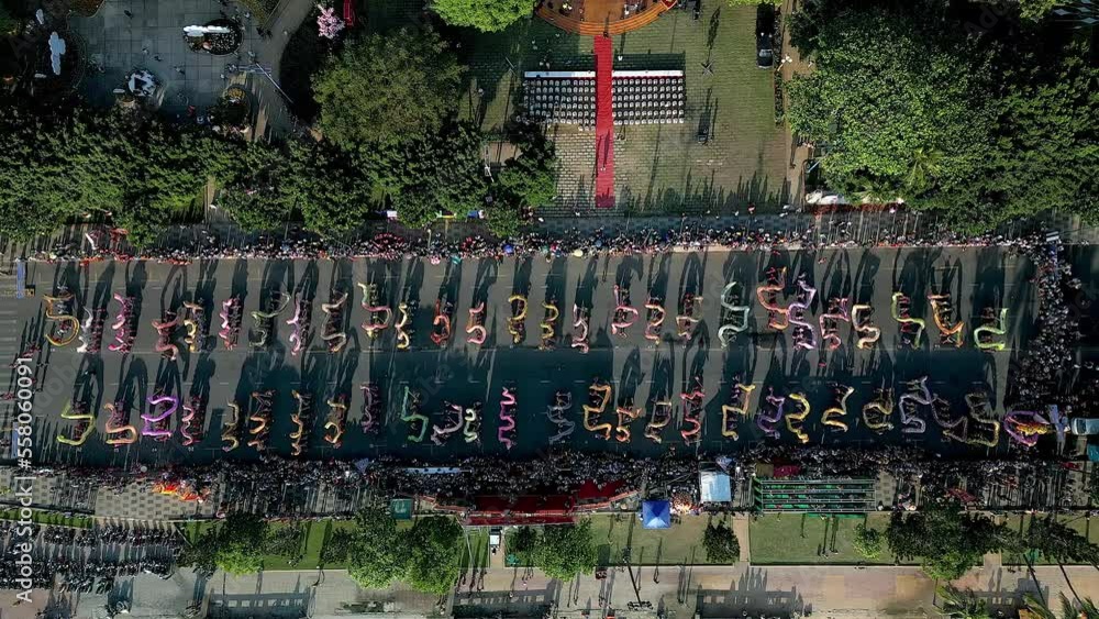 Top view of dragon dance perform celebration new year. Group of people ...