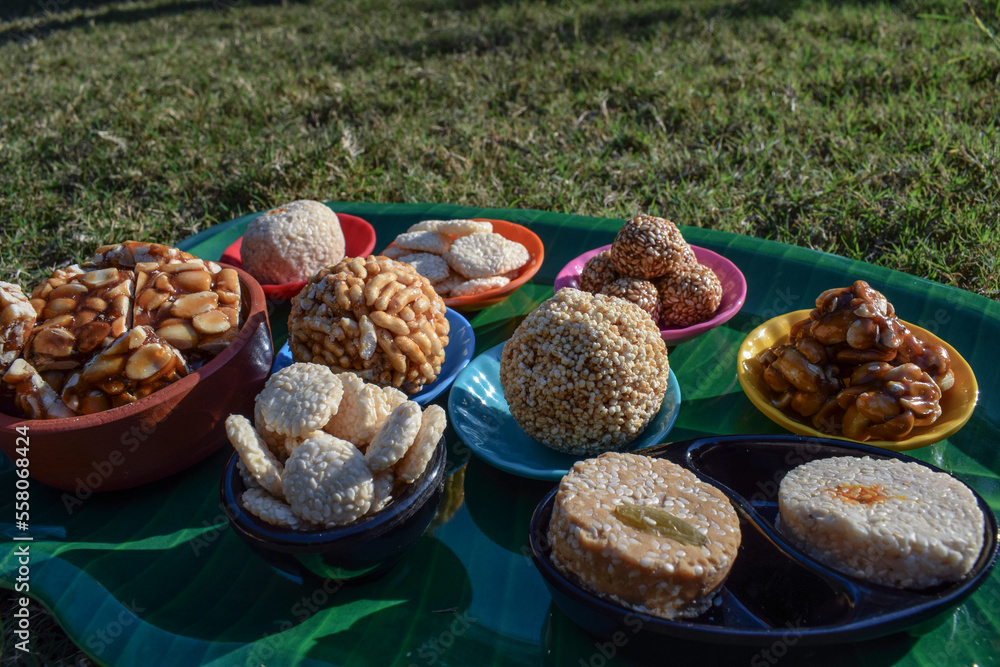 Makar sankranti special cuisine dish items Rewri, Tilgul, Til ke laddu ...