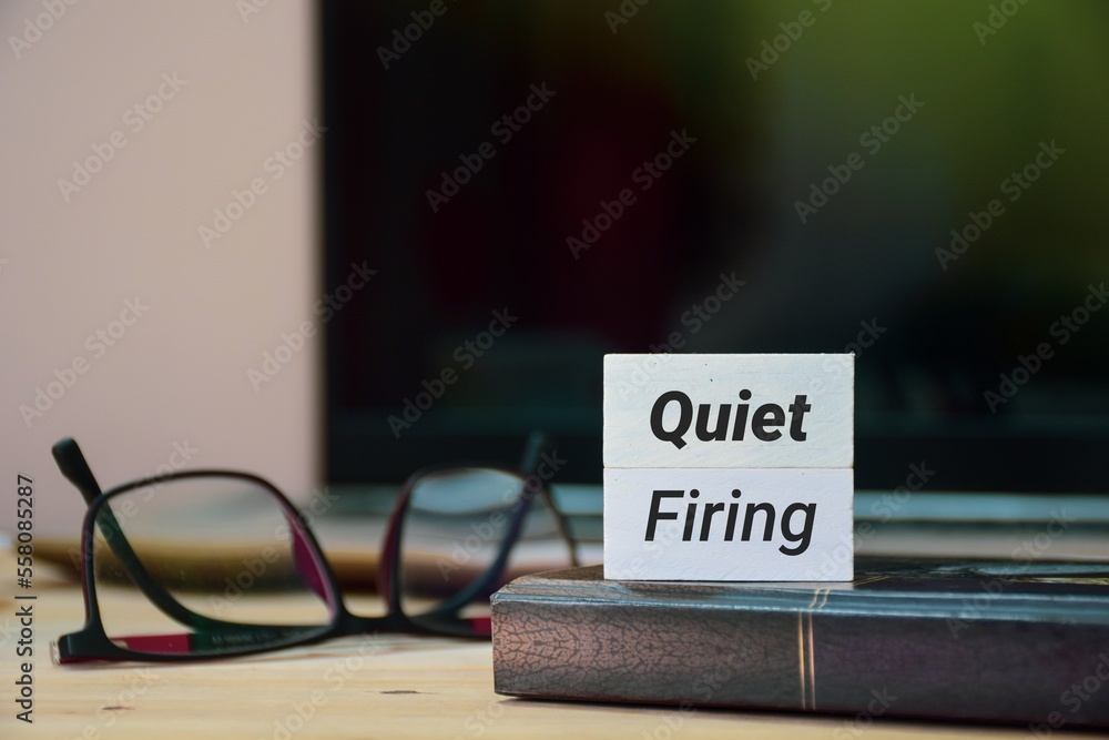 Quiet Firing message on workplace. Stock Photo | Adobe Stock