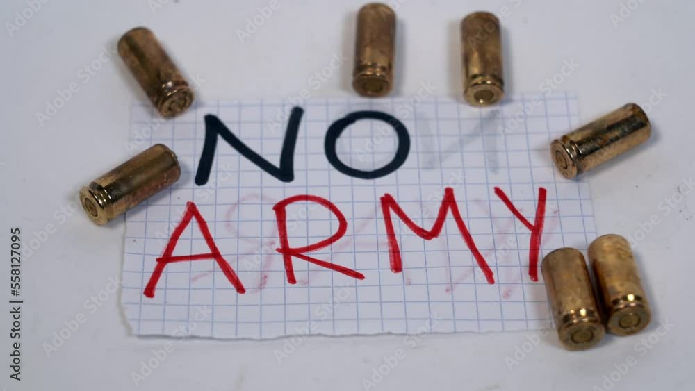 No Army and no war logo sign with 9 mm revolver gun ballets - peace ...