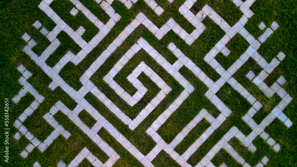 floor plan of a garden with a mosaic of tiles in the shape of a twisted ...