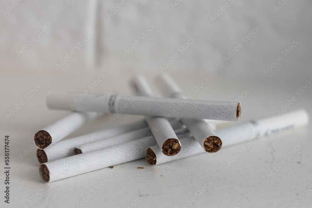 Many cigarettes stacked together. Drugs are harmful to the respiratory ...