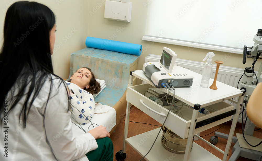 Happy pregnant female visiting her own gynecologist in medical clinic ...