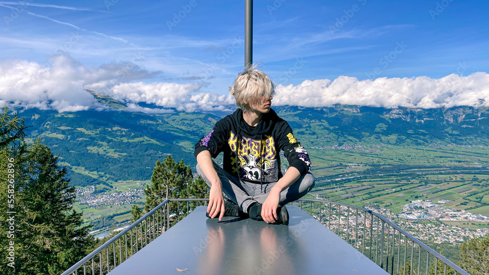 man with a mountainscape background, man with a mountain skyline ...