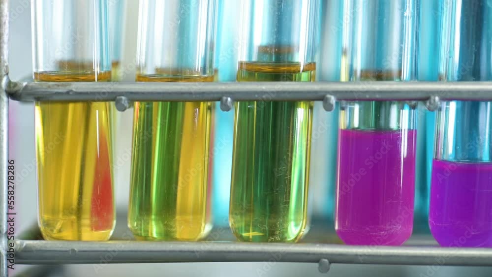 Microbiological Scientist inject liquid or dropping from pipette into ... Microbiological Scientist inject liquid or dropping from pipette into ...