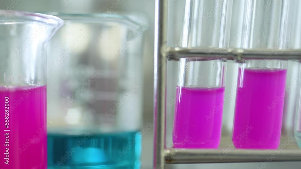 Microbiological Scientist inject liquid or dropping from pipette into ... Microbiological Scientist inject liquid or dropping from pipette into ...