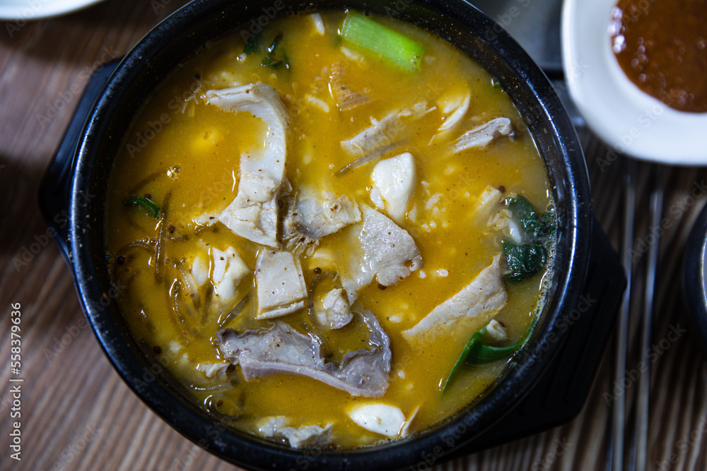Boiled beef intestines, japchae, soybean paste, vegetables, and green ...