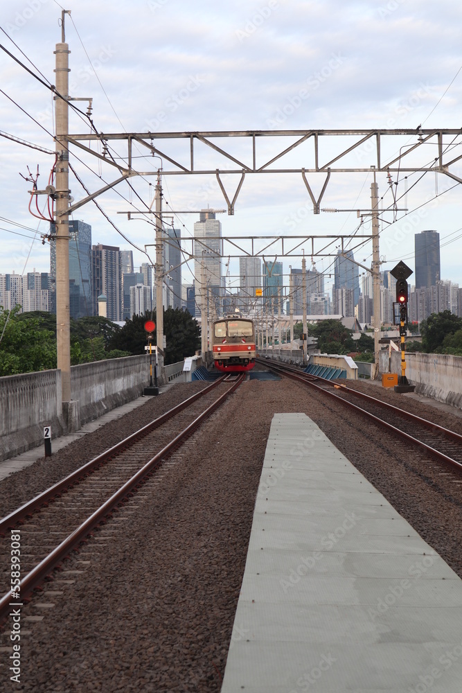 Fototapeta KRL Commuterline, or known as Commuterline, is a commuter ... Fototapeta KRL Commuterline, or known as Commuterline, is a commuter ...