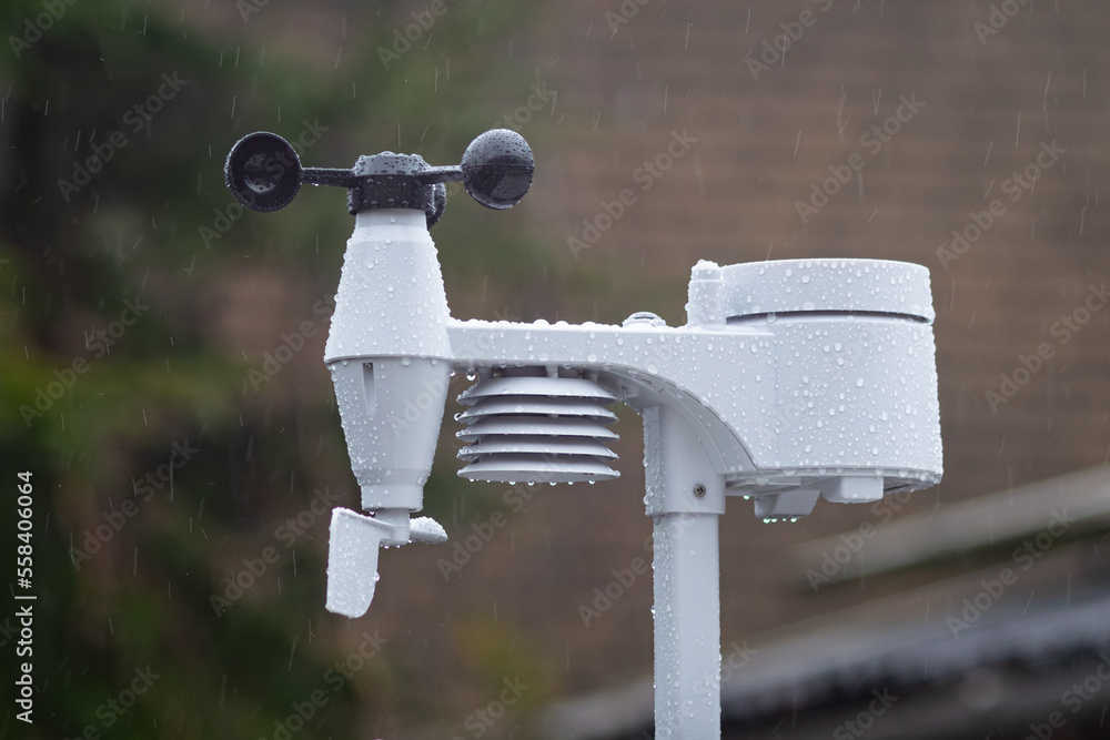 Weather station measuring temperature, humidity, precipitation, wind ...
