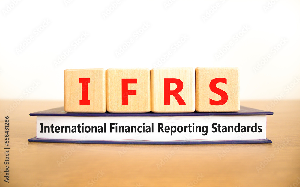 IFRS symbol. Concept words IFRS international financial reporting standards on block on ...