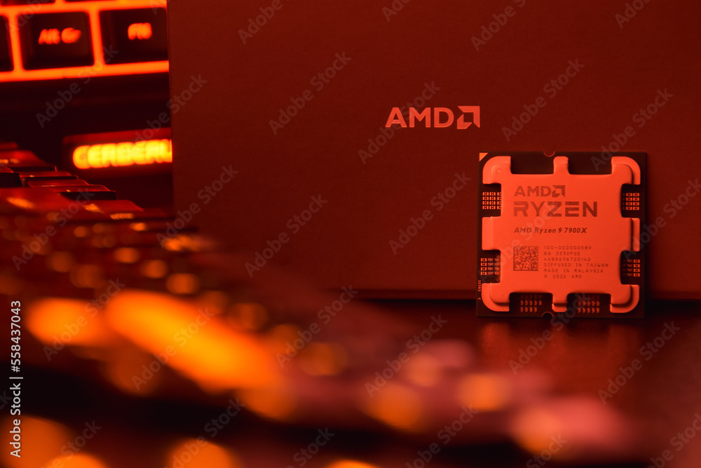 A close-up of an AMD Ryzen 9 3900X processor in a packaging box with ...