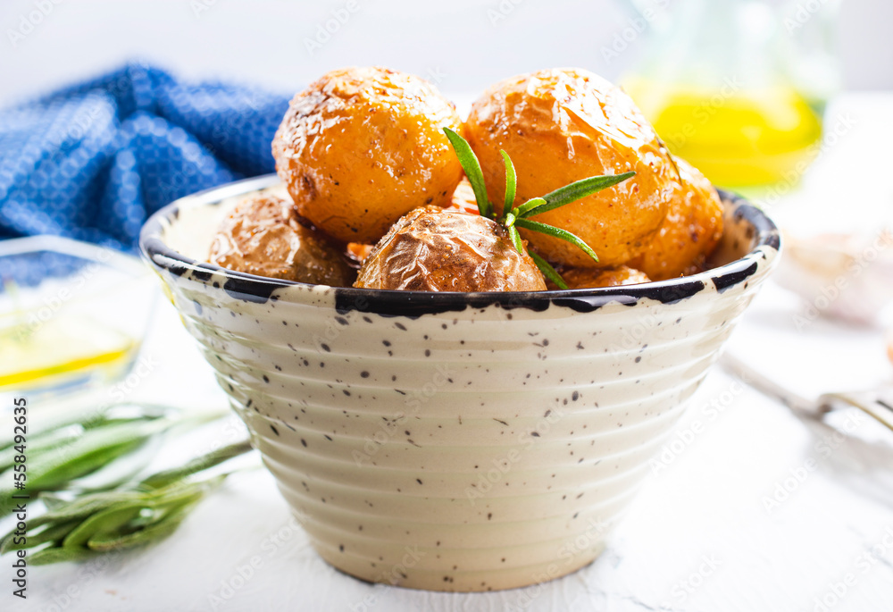 baked potatoes whole in their skins with rosemary and garlic Stock ...