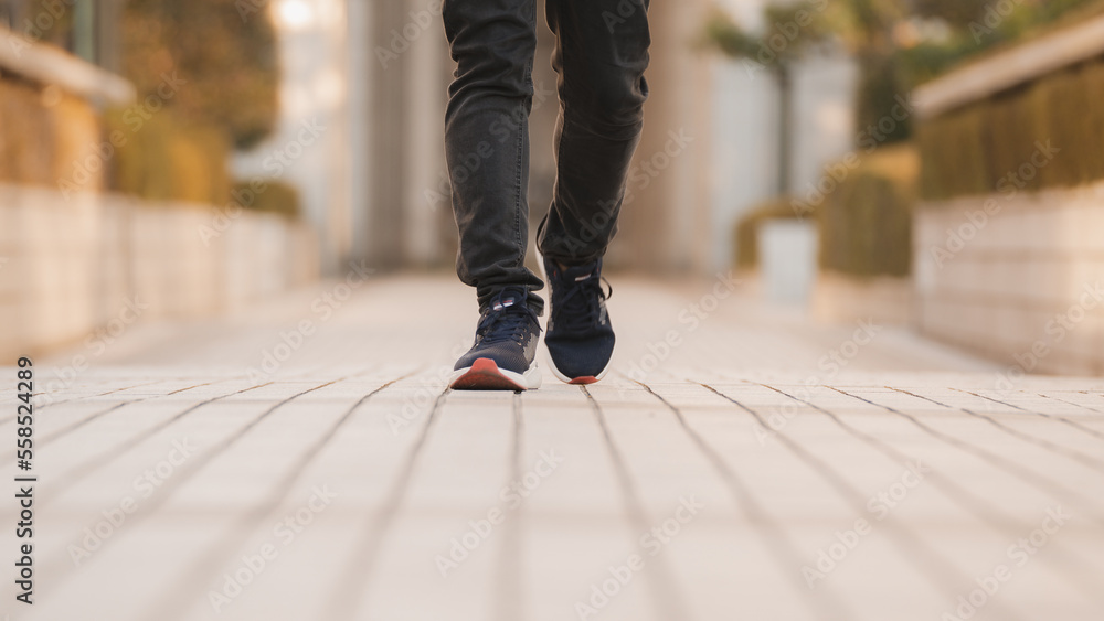 Walking legs with blur background Stock Photo | Adobe Stock