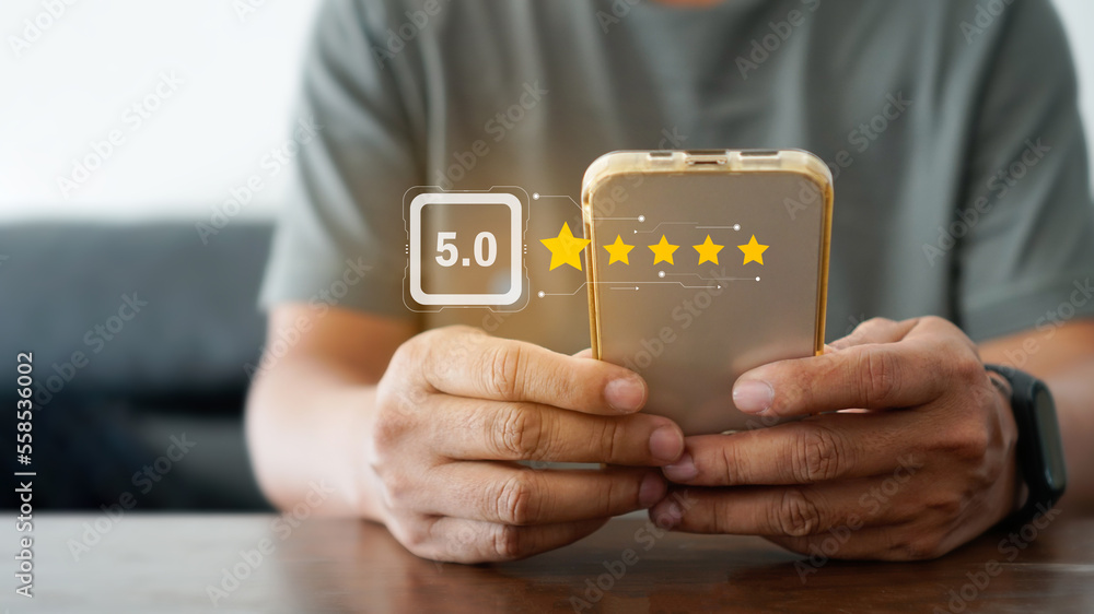 People are touching a virtual screen that has a satisfaction icon to ...